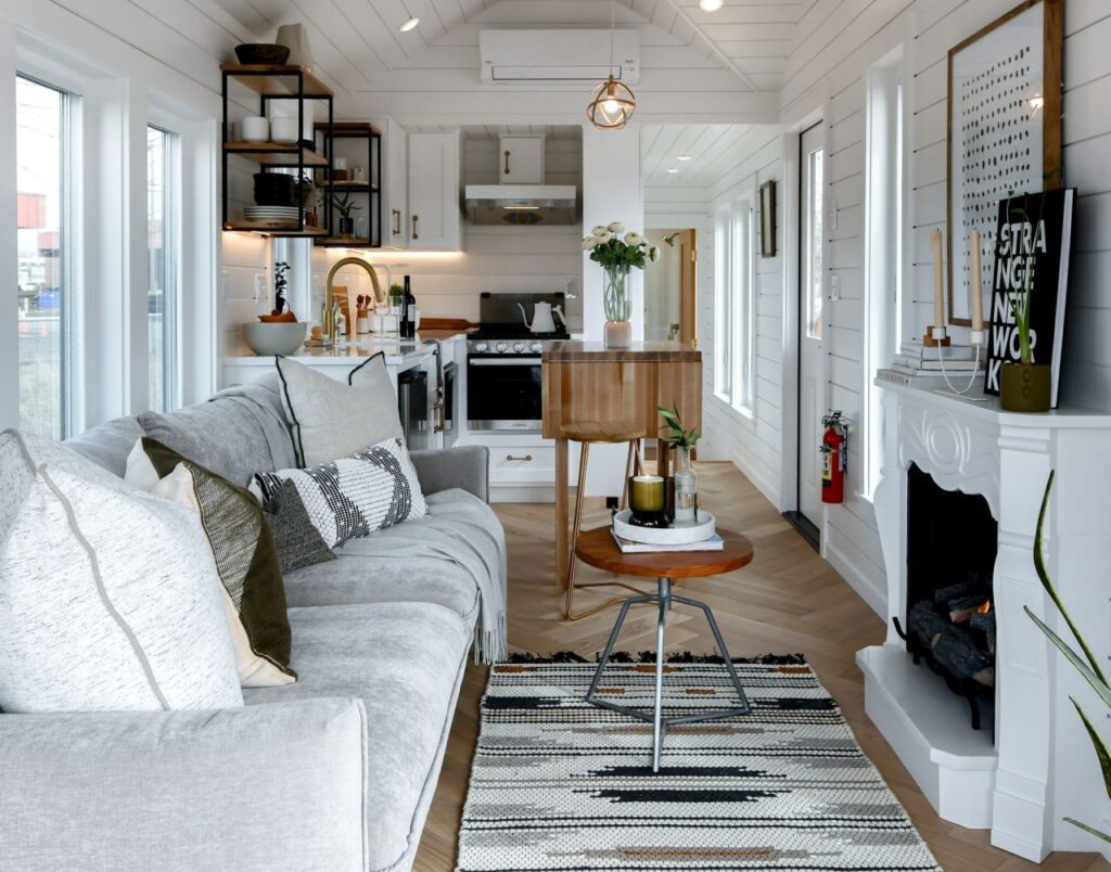 $250K Cascade Mini Tiny House has Spiral Stairs to Rooftop Deck