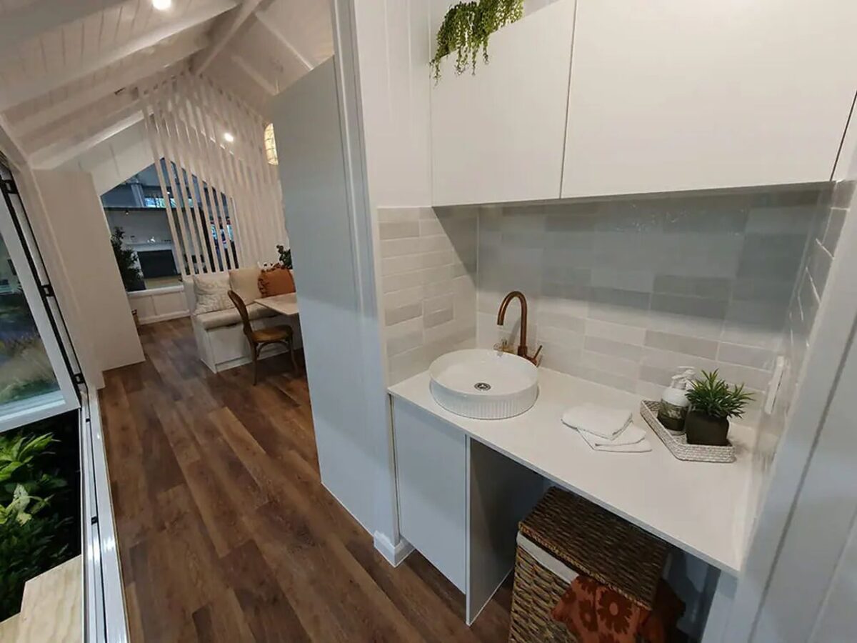 Single-Level Eden Tiny House Features Sliding Glass Doors