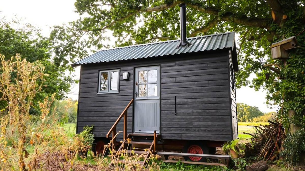 This Tiny House Flaunts a Split Level Kitchen and Office Nook