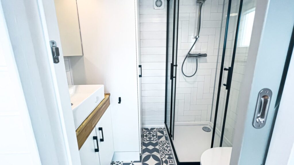 27ft Tangerine Tiny House Flaunts Enclosed Lofts, and Fireplace