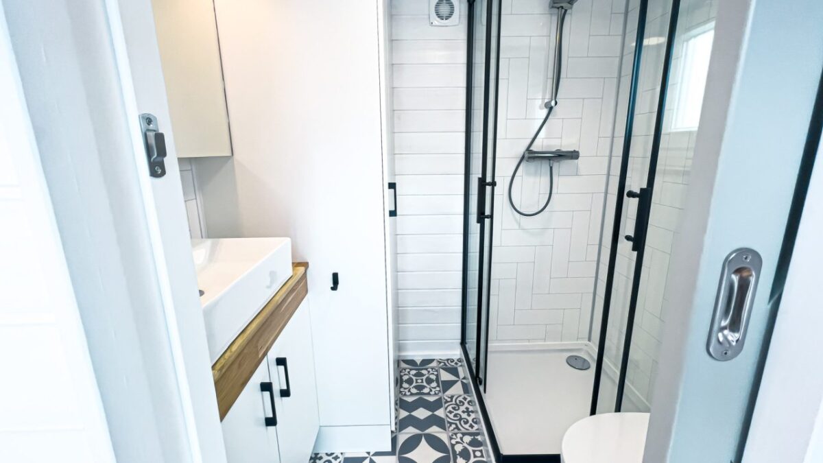 27ft Tangerine Tiny House Flaunts Enclosed Lofts, and Fireplace