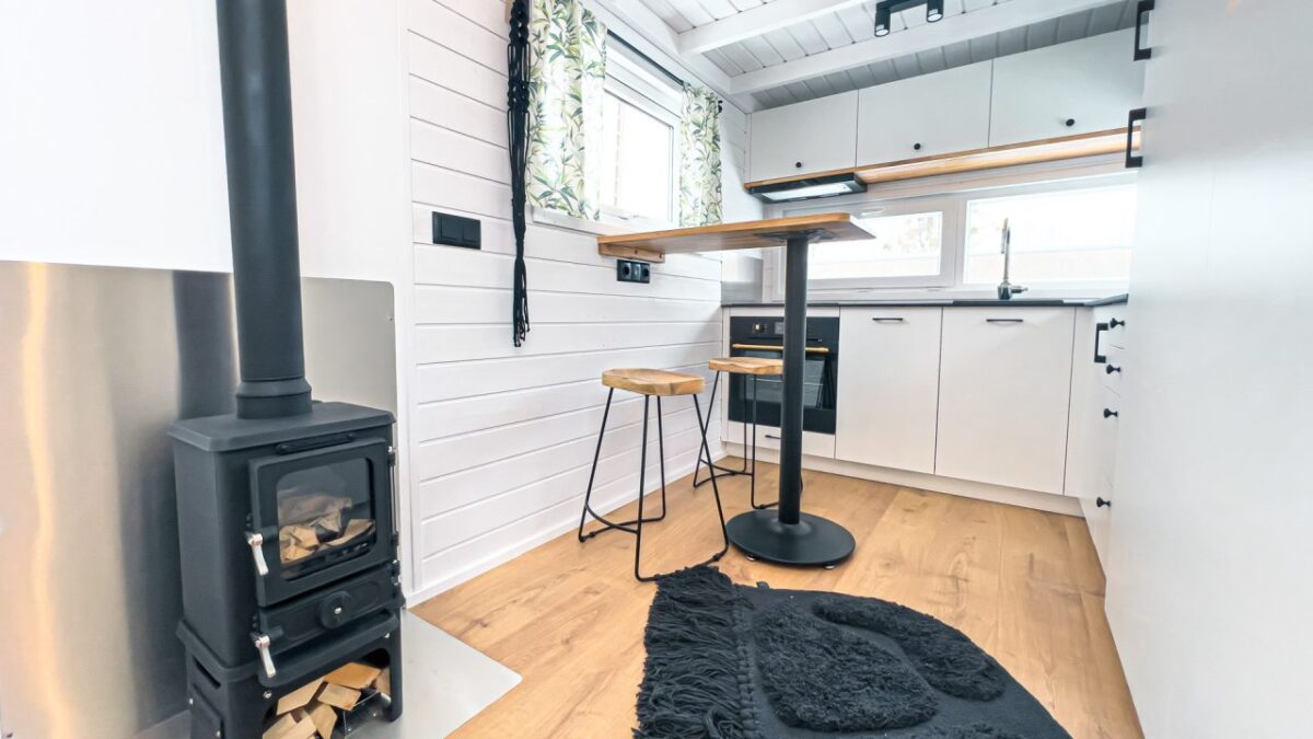 27ft Tangerine Tiny House Flaunts Enclosed Lofts, and Fireplace