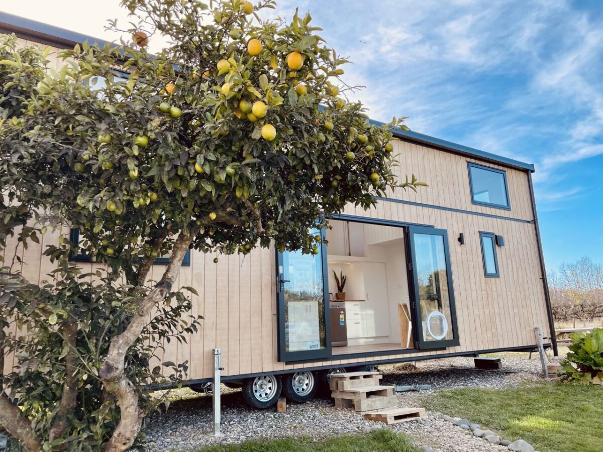 Double-Story Tiny House Flaunts 3 Bedrooms in $140,000 Package