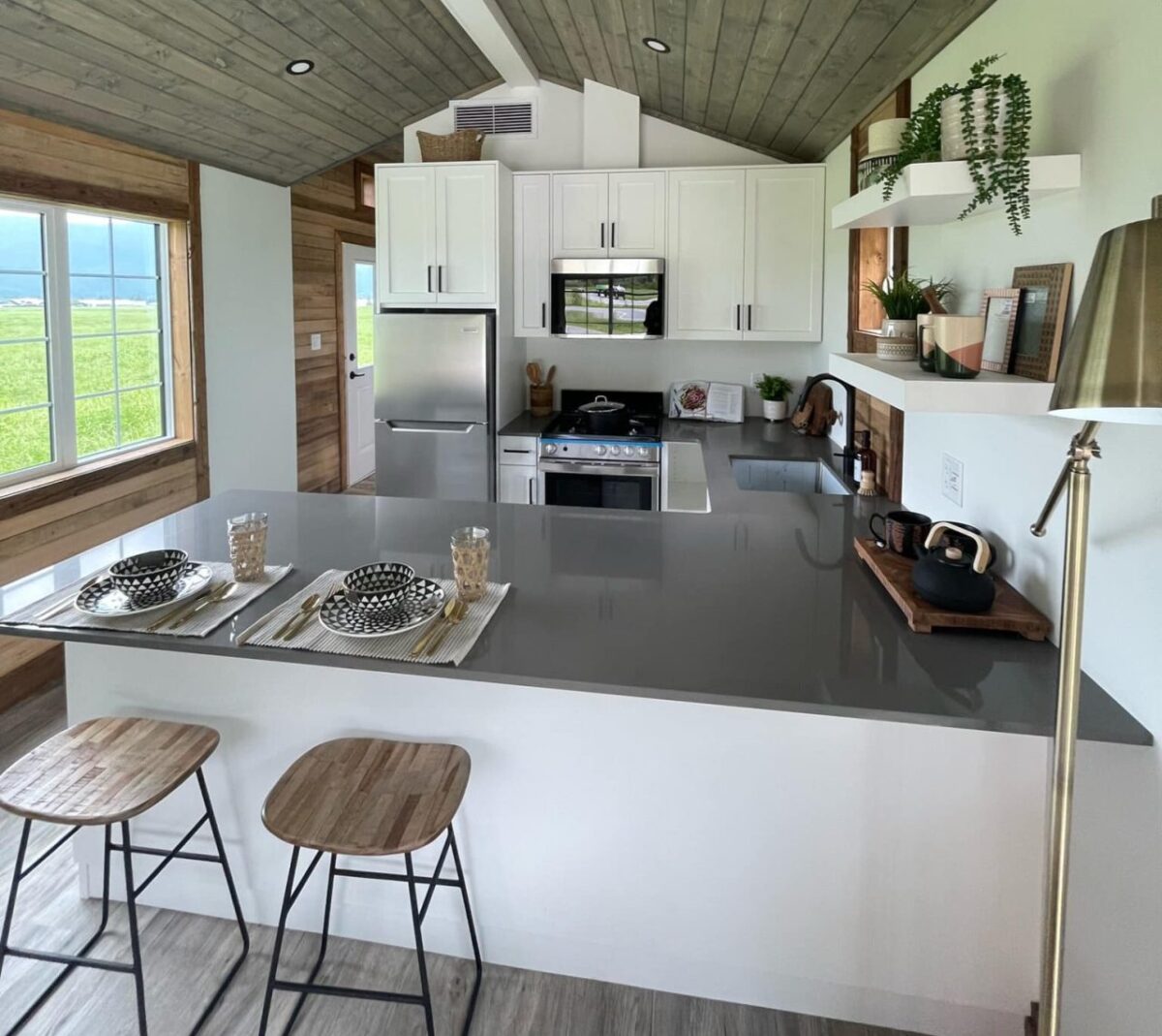 Cottage-Core Elkhorn Tiny House Sleeps Four in Stunning Layout