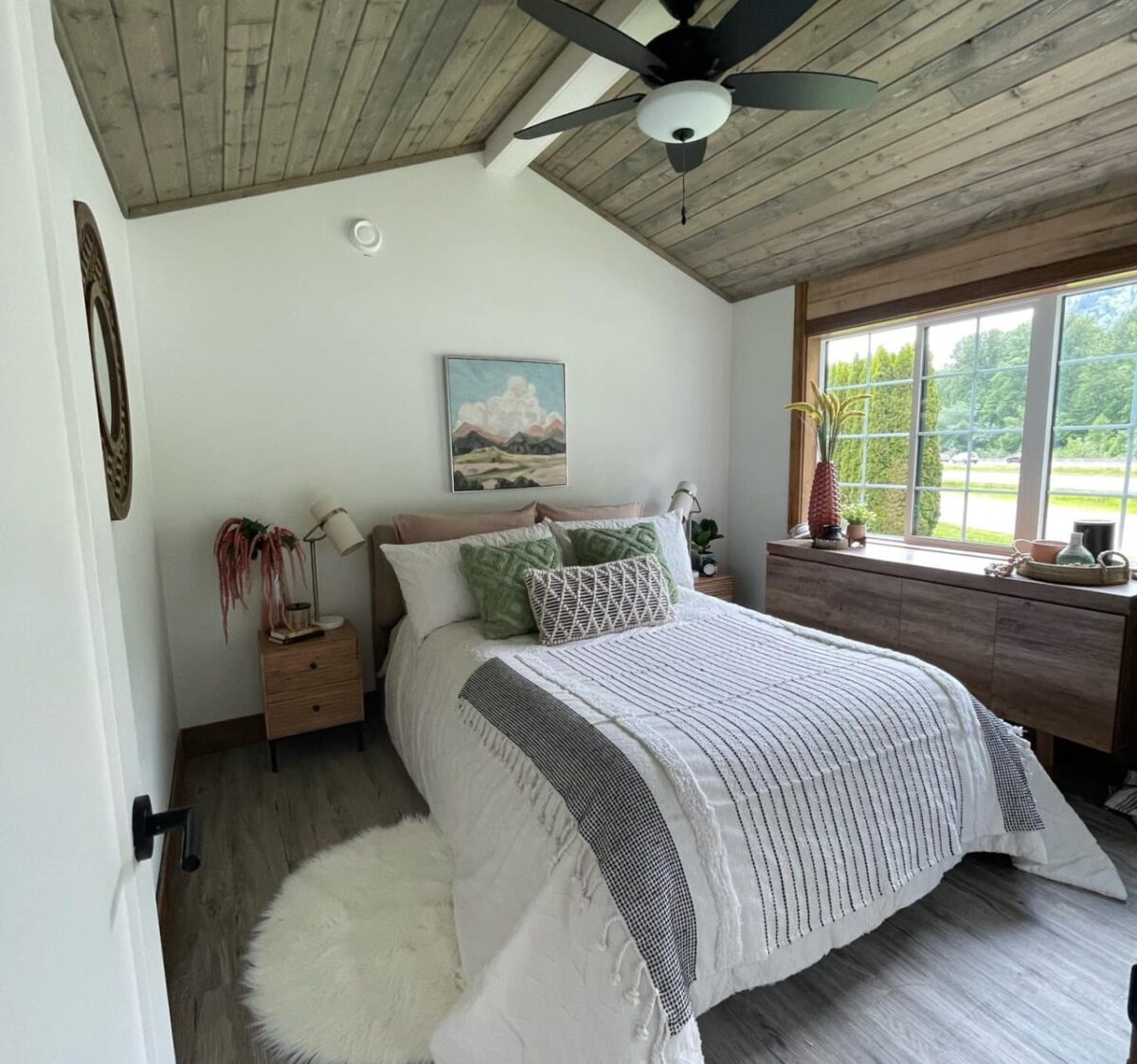 Cottage-Core Elkhorn Tiny House Sleeps Four in Stunning Layout