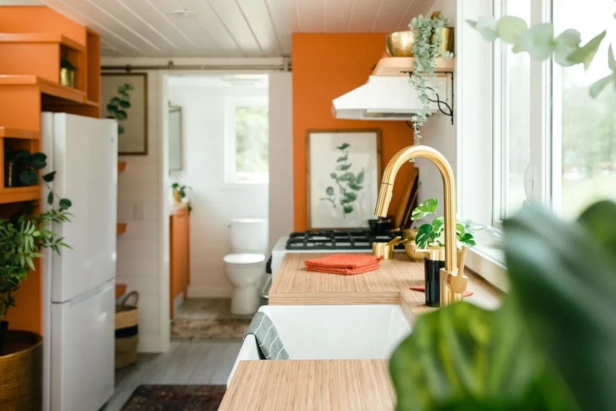 Aspen Tiny House Flaunts Blue Wooden Exterior & Orange Interior
