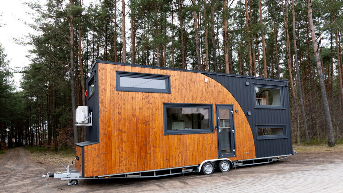 Melon Tiny House has Reverse Loft Layout With Porthole Windows