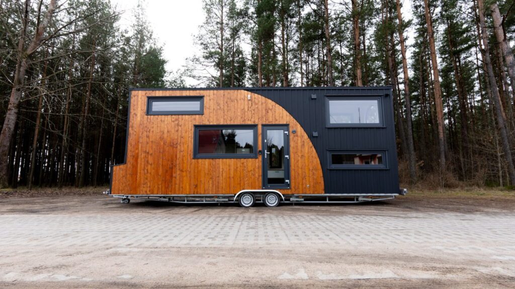 Melon Tiny House has Reverse Loft Layout With Porthole Windows
