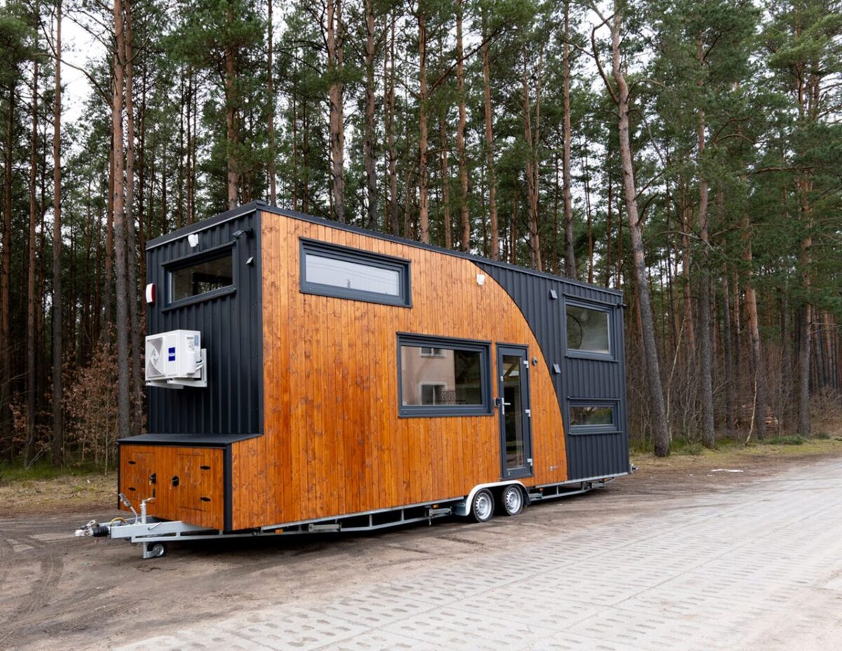 Melon Tiny House has Reverse Loft Layout With Porthole Windows