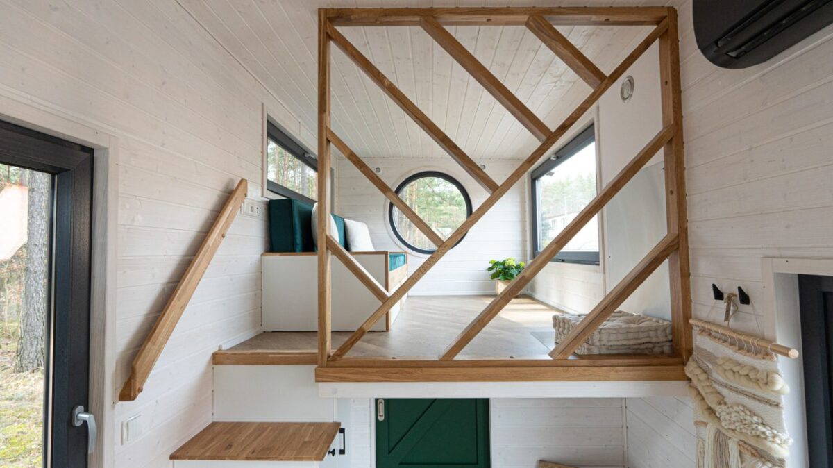 Melon Tiny House has Reverse Loft Layout With Porthole Windows