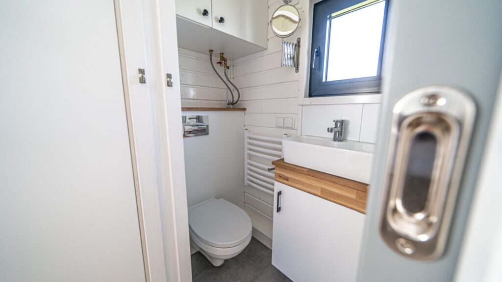 Snowdrop Tiny House is Cozy, Bright Home With Twin Lofts