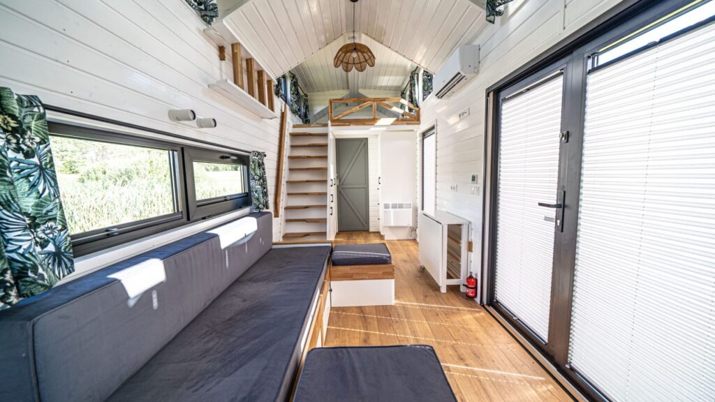 Snowdrop Tiny House is Cozy, Bright Home With Twin Lofts