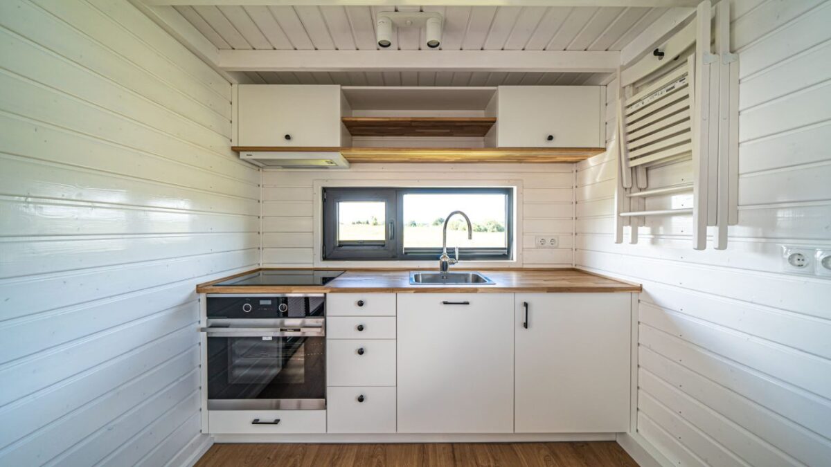 Snowdrop Tiny House is Cozy, Bright Home With Twin Lofts