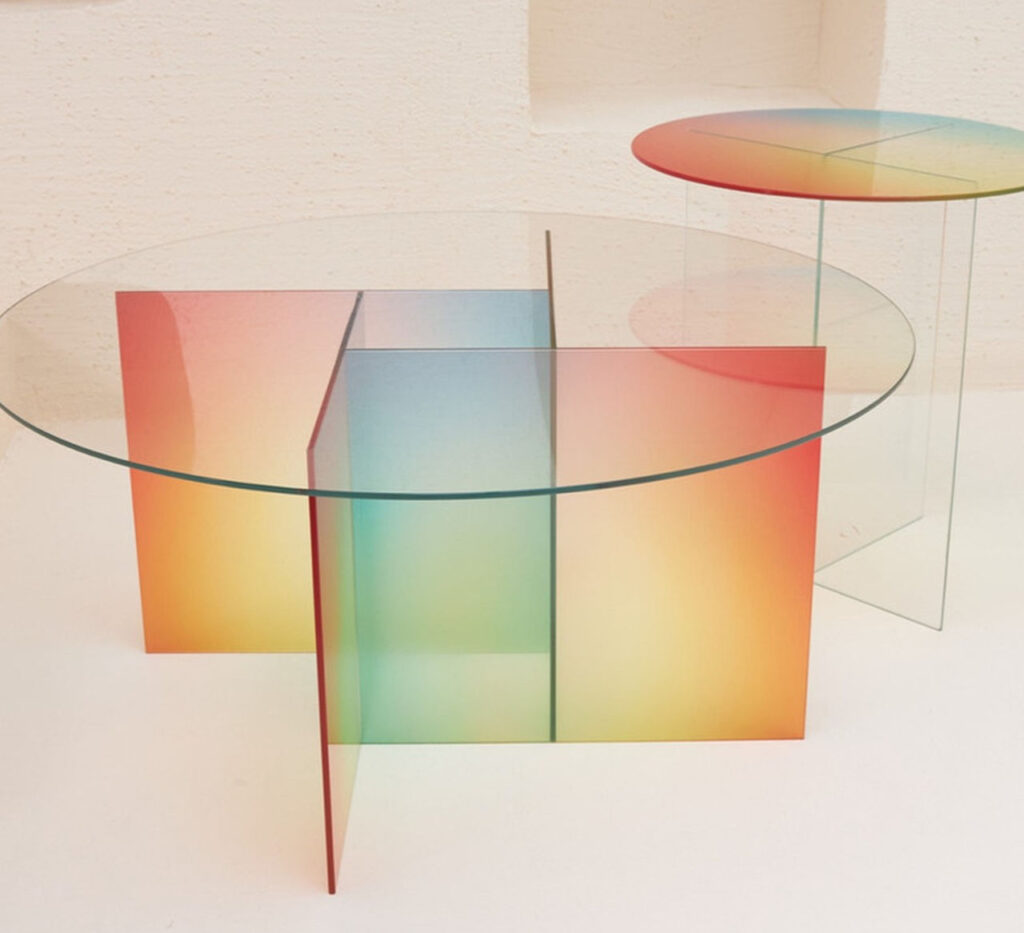 Series of Light and Glass Tables Draw in With Delicate Space Affair
