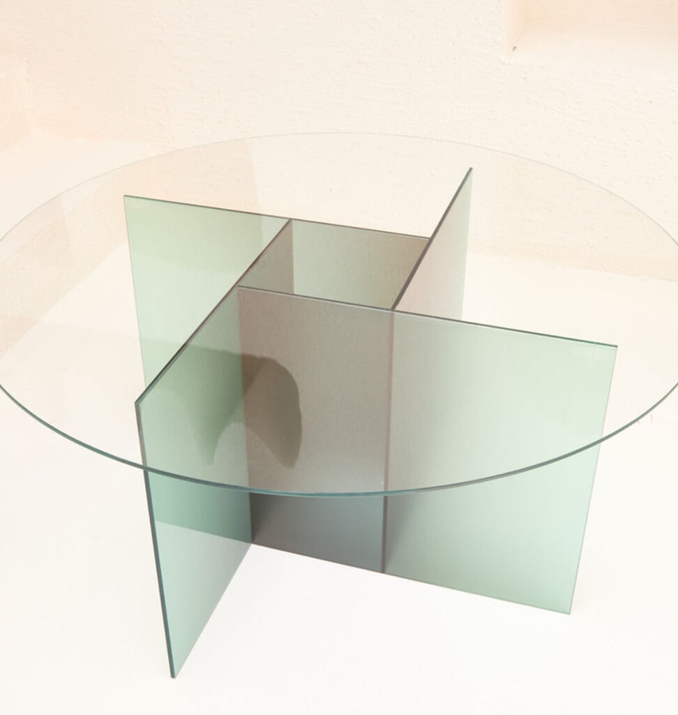 Series of Light and Glass Tables Draw in With Delicate Space Affair