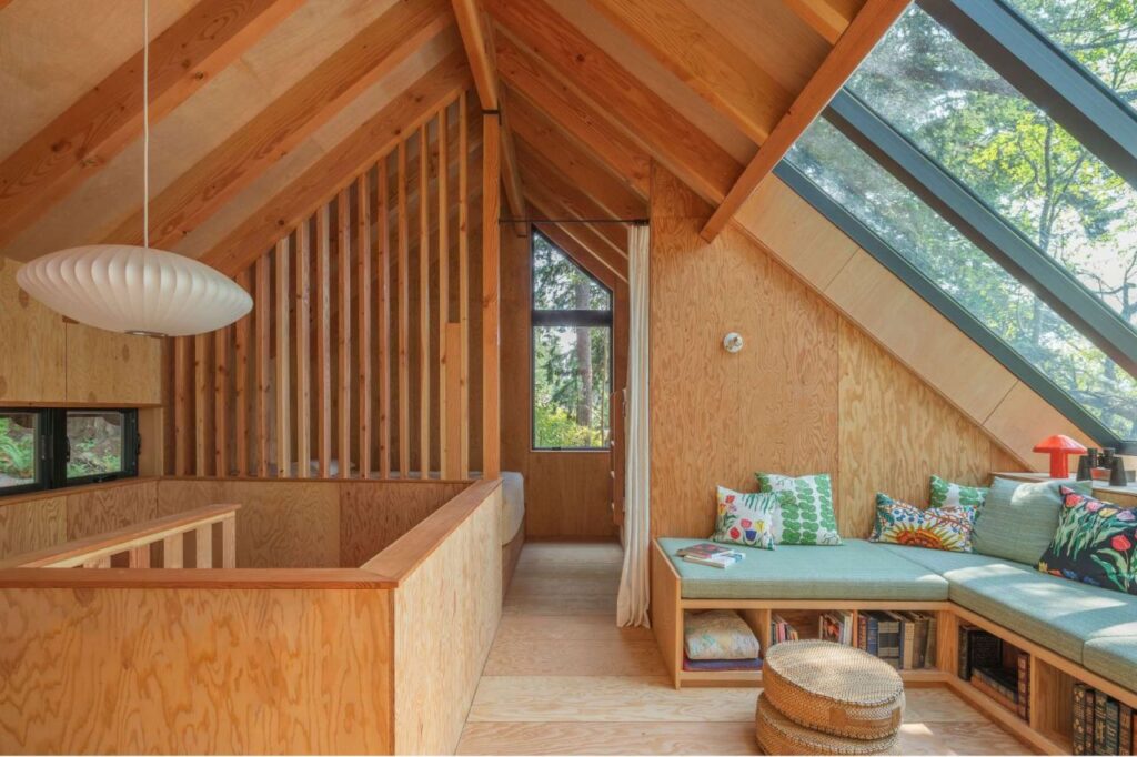 Bunkhouse is Two-Story Modern Log Cabin With Gaping Skylight