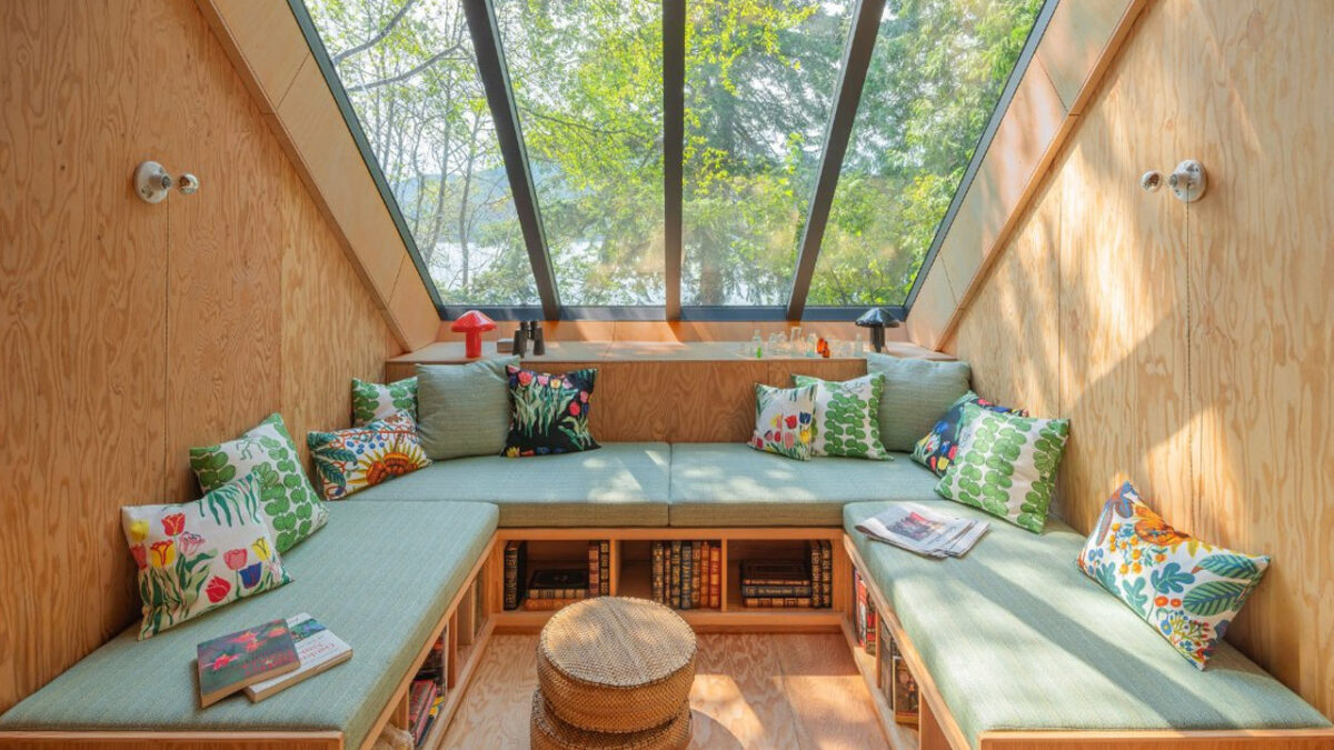 Bunkhouse is Two-Story Modern Log Cabin With Gaping Skylight