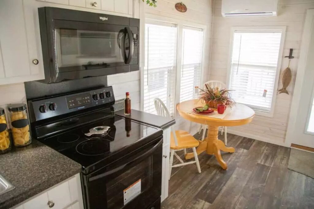 Titus Tiny House has Front Porch, Bunk Beds and Master Bedroom