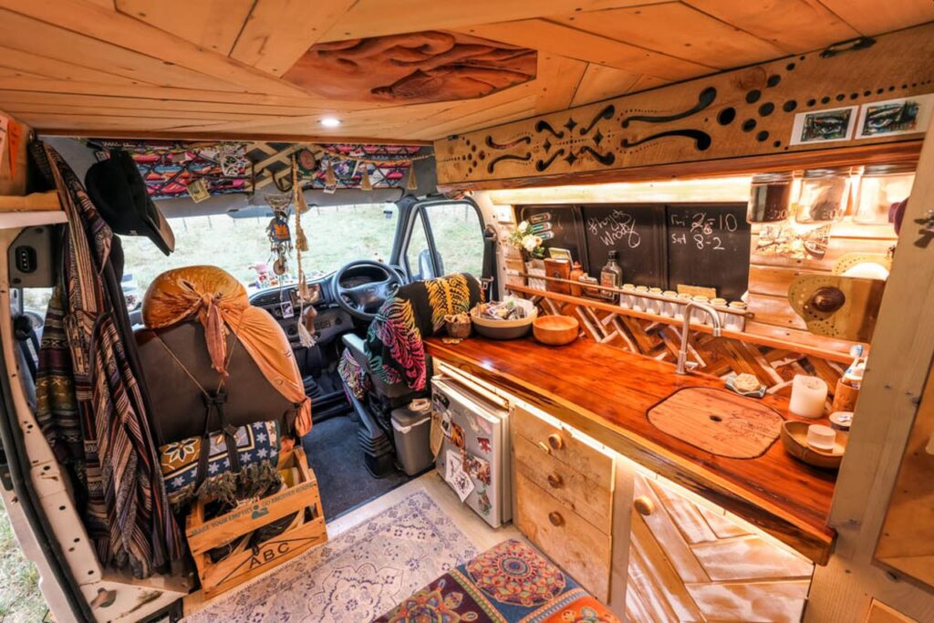 Woodworker Turns '98 Ford Transit Into Van Home Etched With Wood Crafts