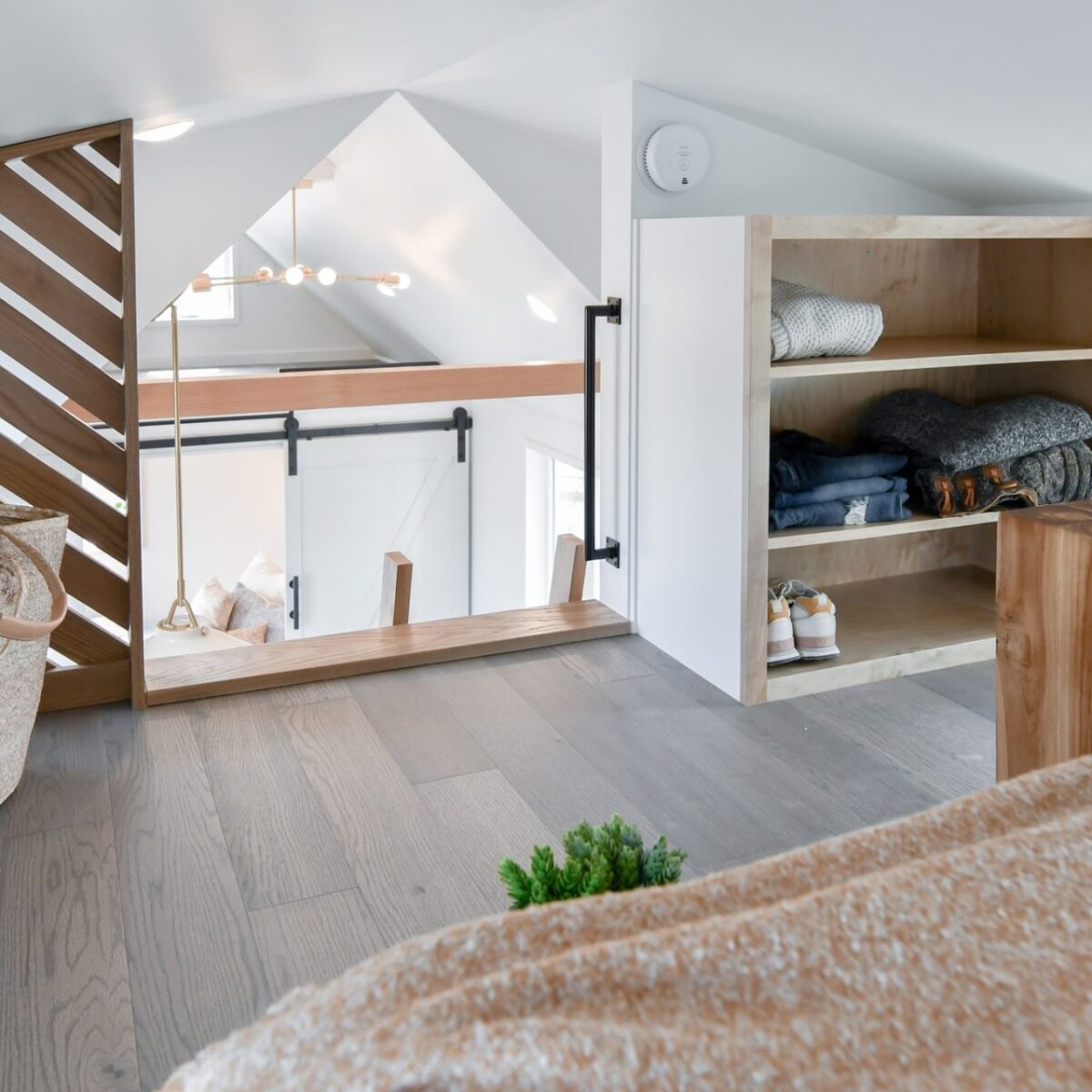 Payette Urban Tiny House has Hidden Main-Floor Bedroom, Two Lofts