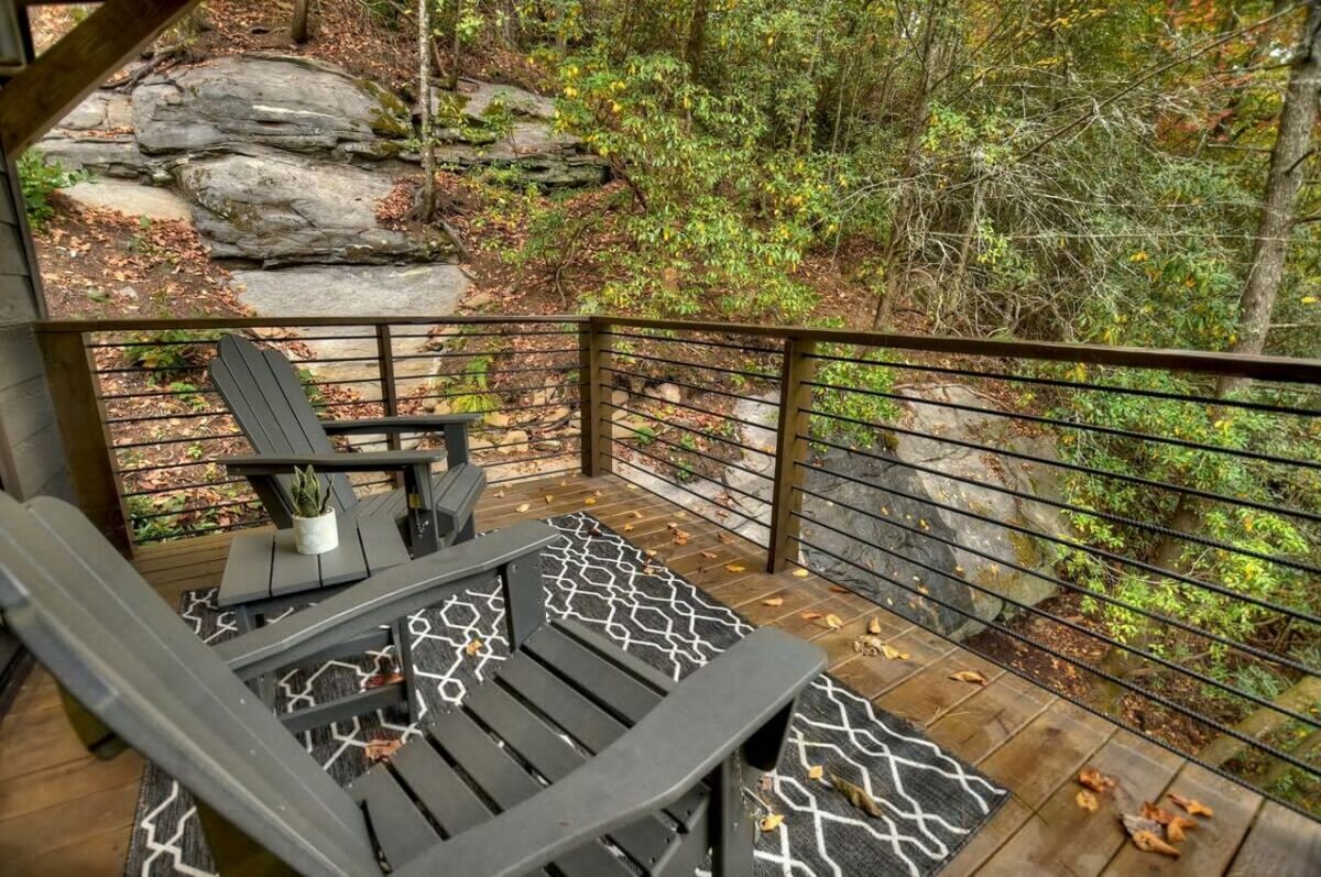 River Rock Treehouse With Open Loft has Wrap-Around Deck