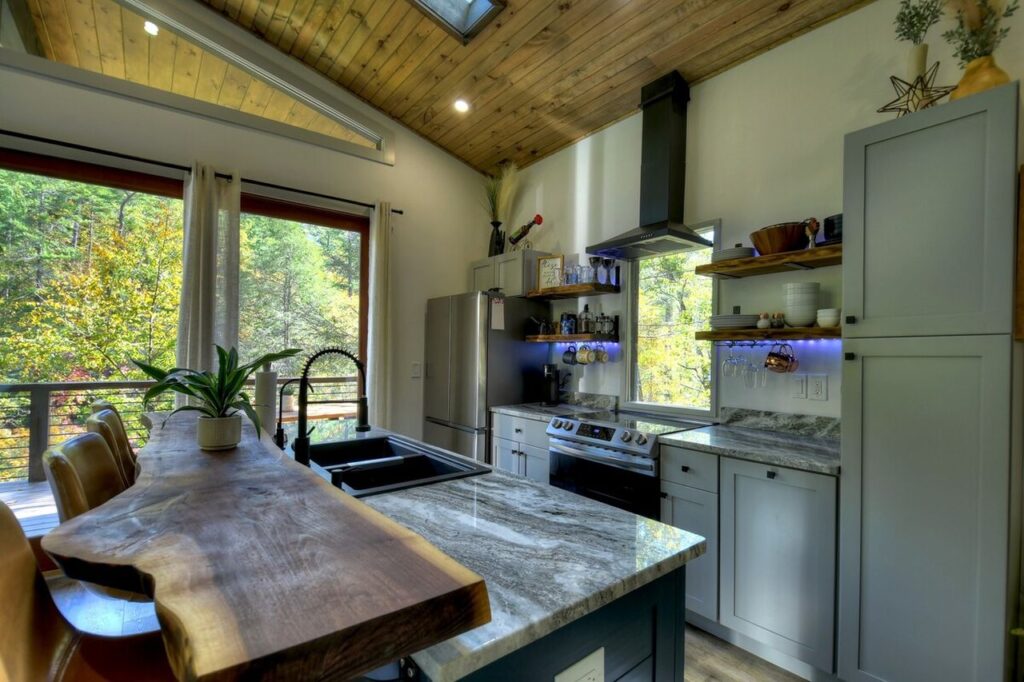 River Rock Treehouse With Open Loft has Wrap-Around Deck