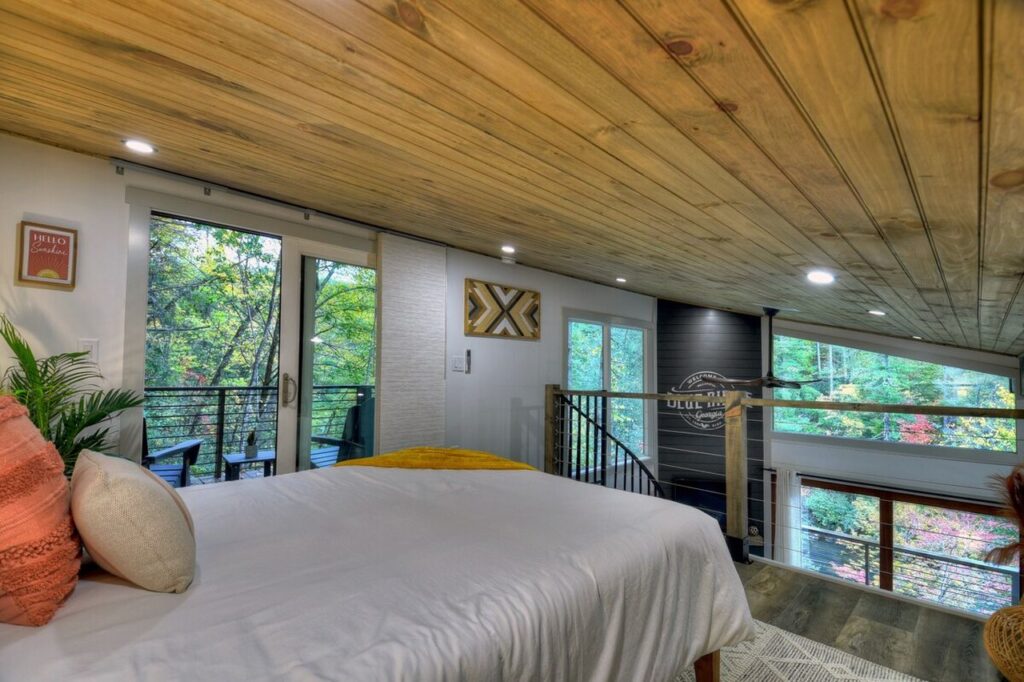 River Rock Treehouse With Open Loft has Wrap-Around Deck