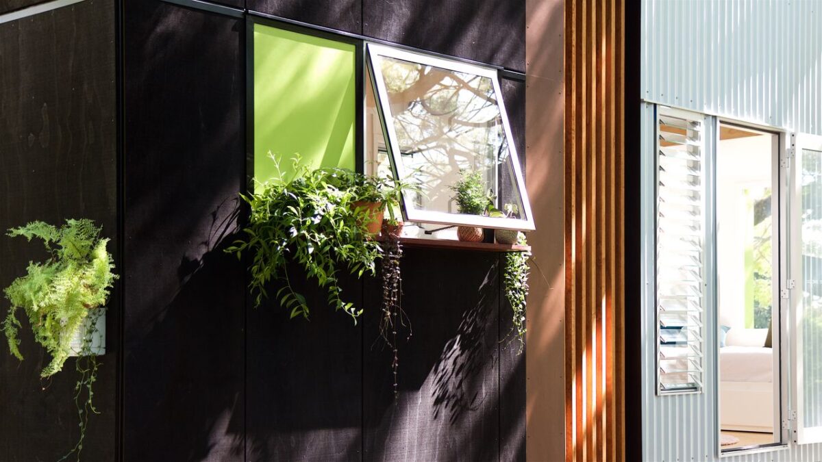 Swallowtail Tiny House With Butterfly Roof has Hidden Access to Loft