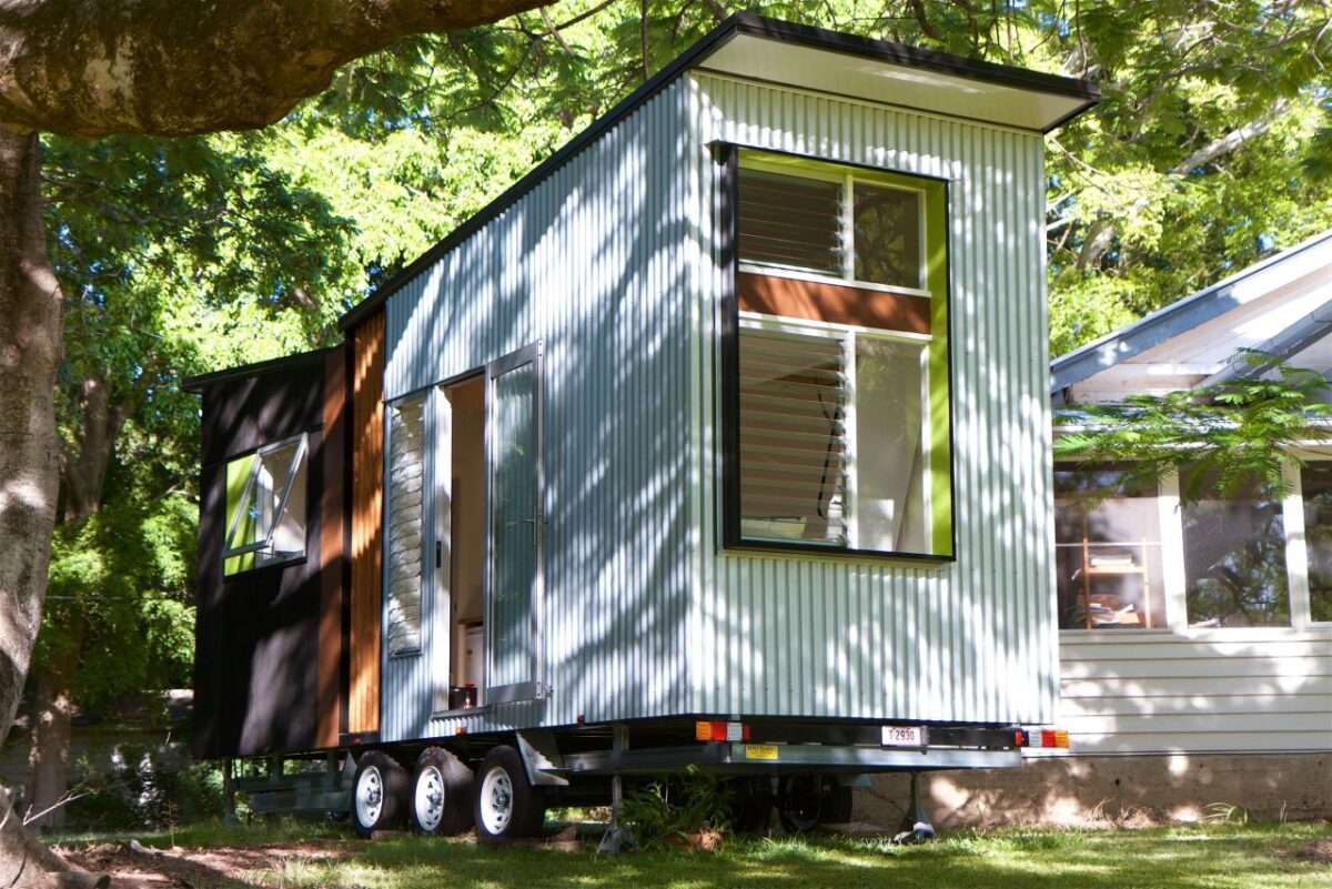 Swallowtail Tiny House With Butterfly Roof has Hidden Access to Loft
