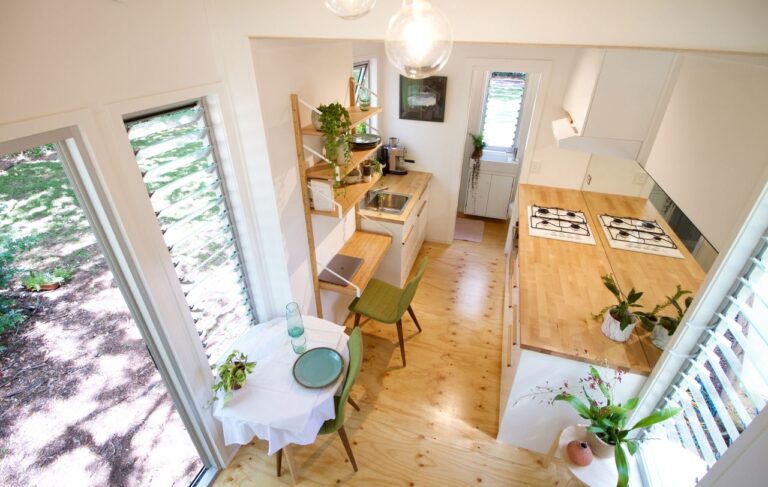 Swallowtail Tiny House With Butterfly Roof has Hidden Access to Loft