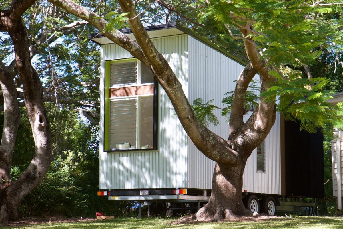 Swallowtail Tiny House With Butterfly Roof has Hidden Access to Loft