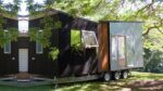 Swallowtail Tiny House With Butterfly Roof has Hidden Access to Loft