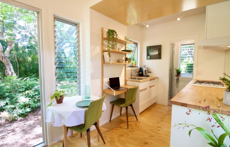 Swallowtail Tiny House With Butterfly Roof has Hidden Access to Loft