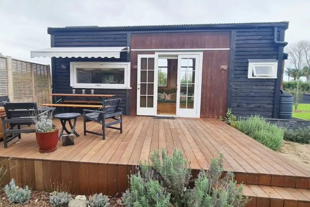 Tahi Tiny House has Twin Lofts in Rustic Layout With Optional Deck