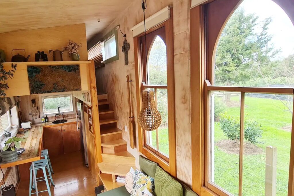Tahi Tiny House has Twin Lofts in Rustic Layout With Optional Deck
