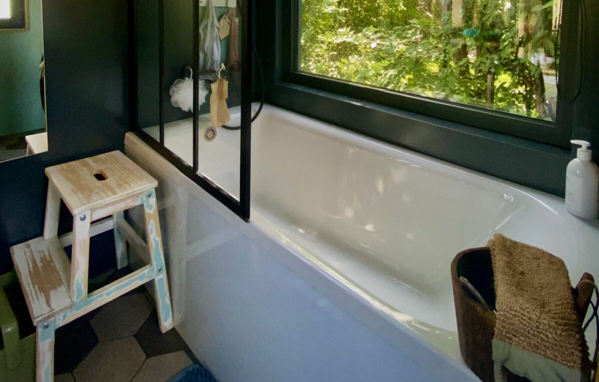 This Retired Woman Lives in Custom Tiny House With Trapdoor Loft