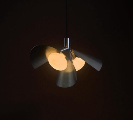 Peel Lamp Bends Single Steel Sheet for Playful Curvaceous Form