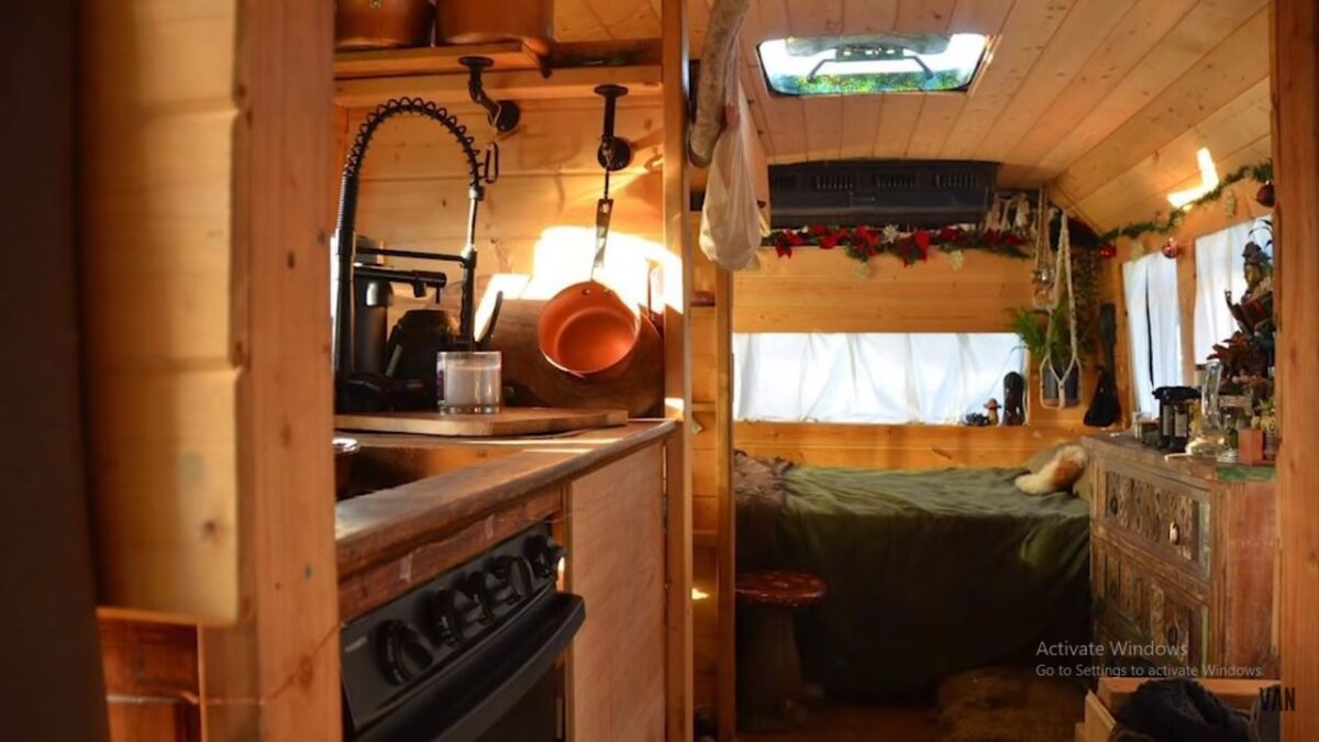 Couple Custom-Builds Treehouse Bus as Full-Time Home