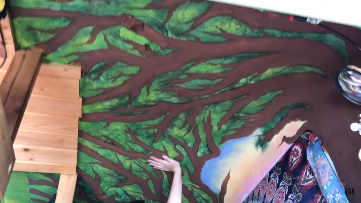 Couple Custom-Builds Treehouse Bus as Full-Time Home