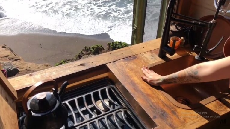 Couple Custom-Builds Treehouse Bus as Full-Time Home