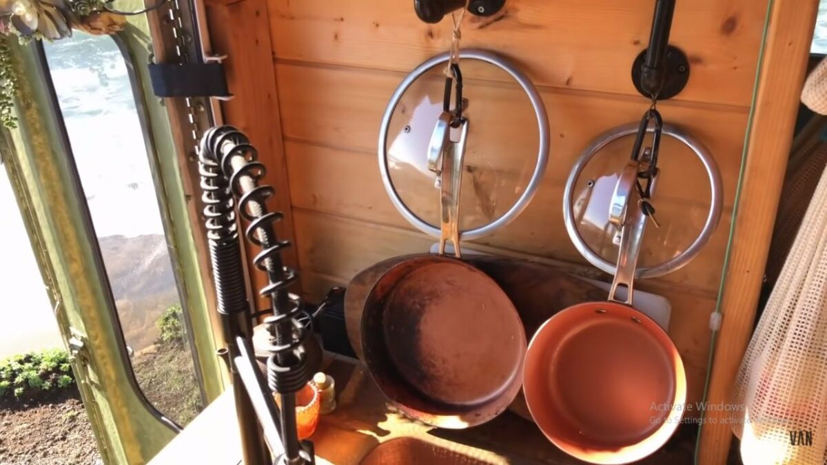 Couple Custom-Builds Treehouse Bus as Full-Time Home