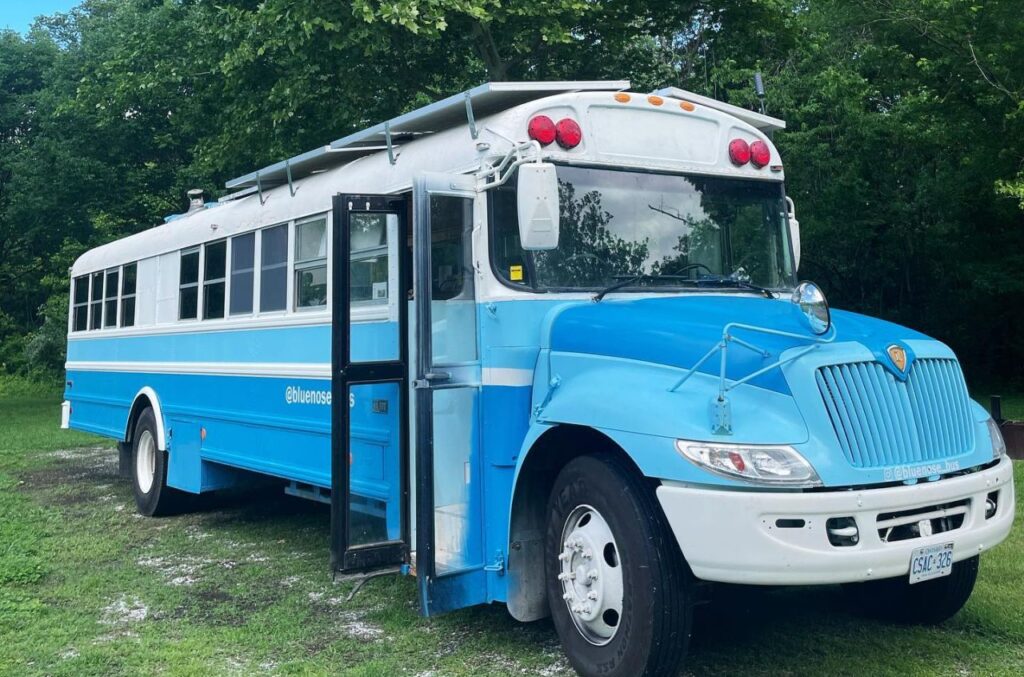This 40ft School Bus is Permanent Off-Grid Home to a Couple