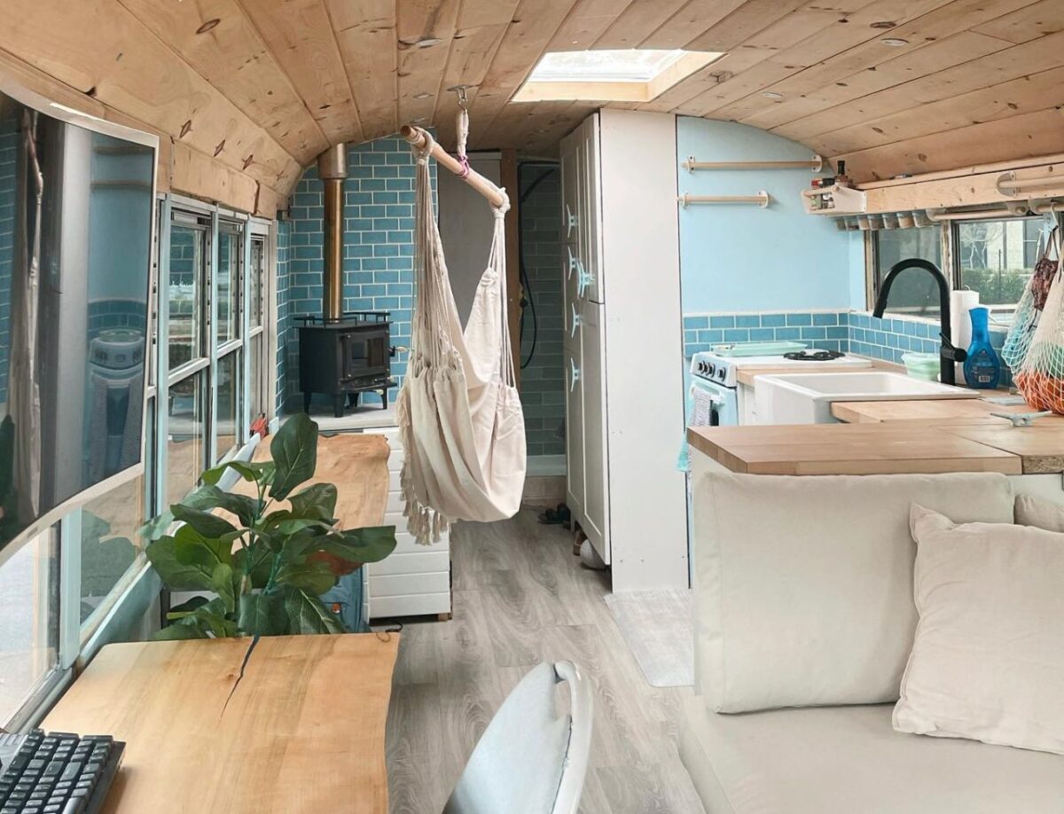 This 40ft School Bus is Permanent Off-Grid Home to a Couple