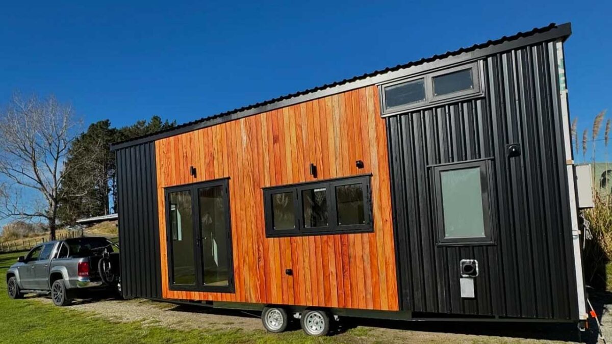 Fantail Tiny House Sleeps Two in its Bright Dual Loft Interior