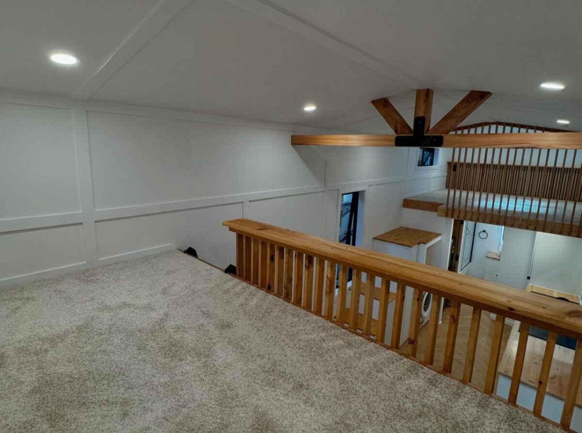 Fantail Tiny House Sleeps Two in its Bright Dual Loft Interior