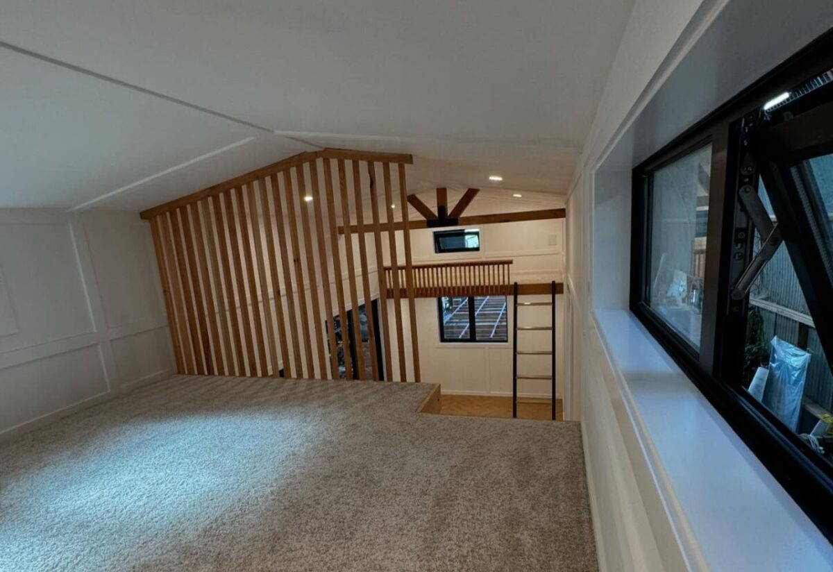 Fantail Tiny House Sleeps Two in its Bright Dual Loft Interior