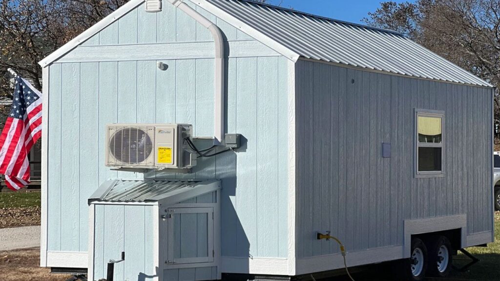 This Old-School Tiny House Features Bedroom With Storage Loft