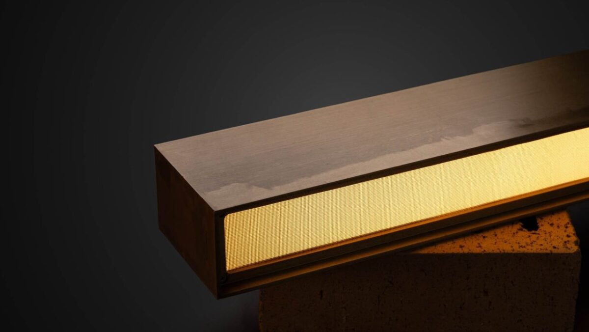 OG Brick Lamp Blends in With the Fabric of Masonry Brick Wall