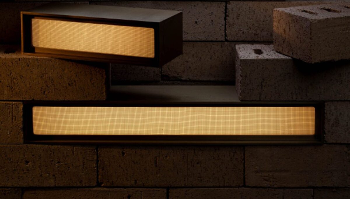 OG Brick Lamp Blends in With the Fabric of Masonry Brick Wall