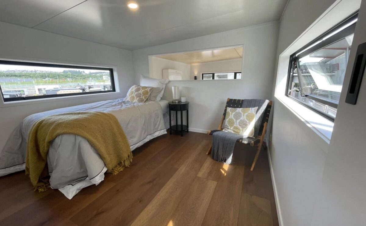 Harmony Tiny House Fits Two Bedrooms in Storage-Friendly Layout